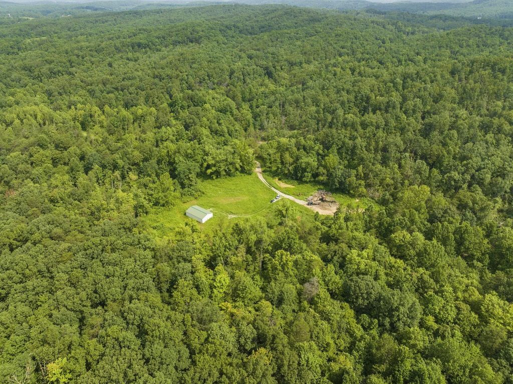 100-Acre Wooded Property with Metal Building in Hope, Kentucky - WA Online
