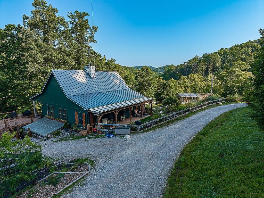 Expansive 150-Acre Lodge Estate with Guest Residence, Spring-Fed Pond ...